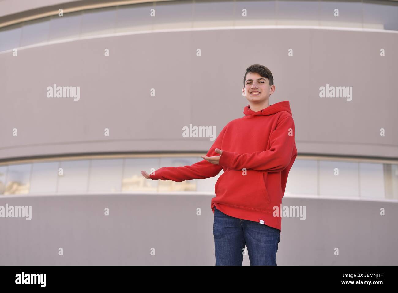 Man in red work clothes hi-res stock photography and images - Alamy