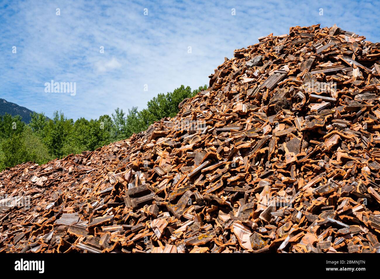 large piles of rubble and broken bricks and cinder blocks from ...