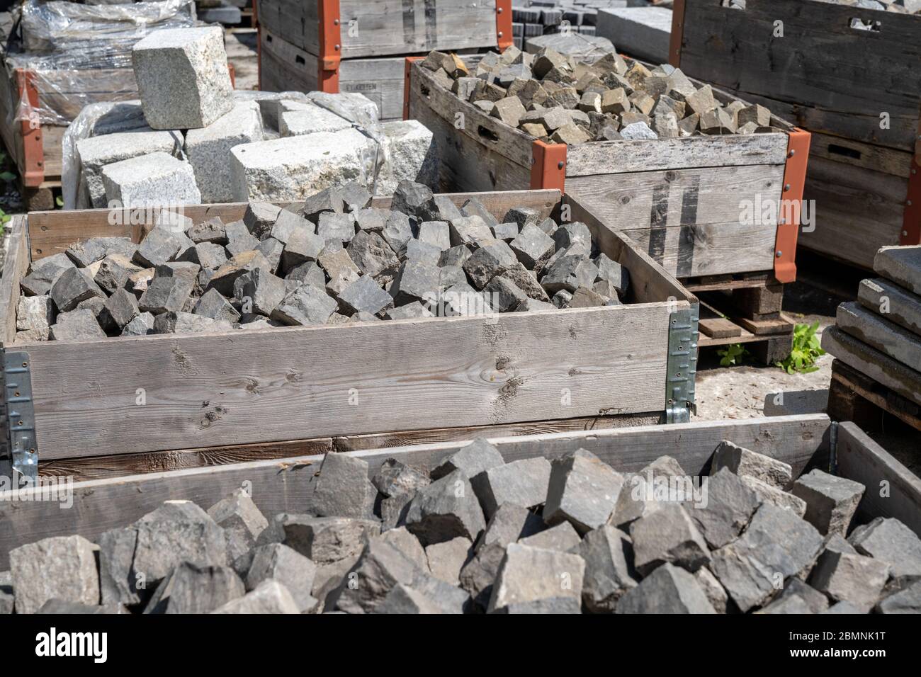 A detail view of cobblestone stones in crates and prepared for delivery ...