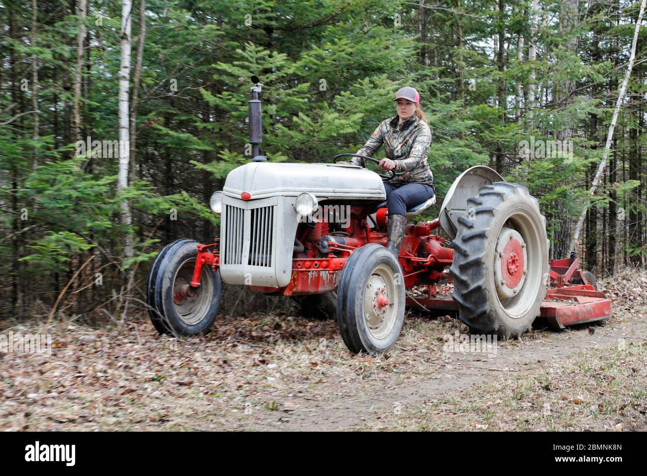 Woman driving tractor hi-res stock photography and images - Alamy