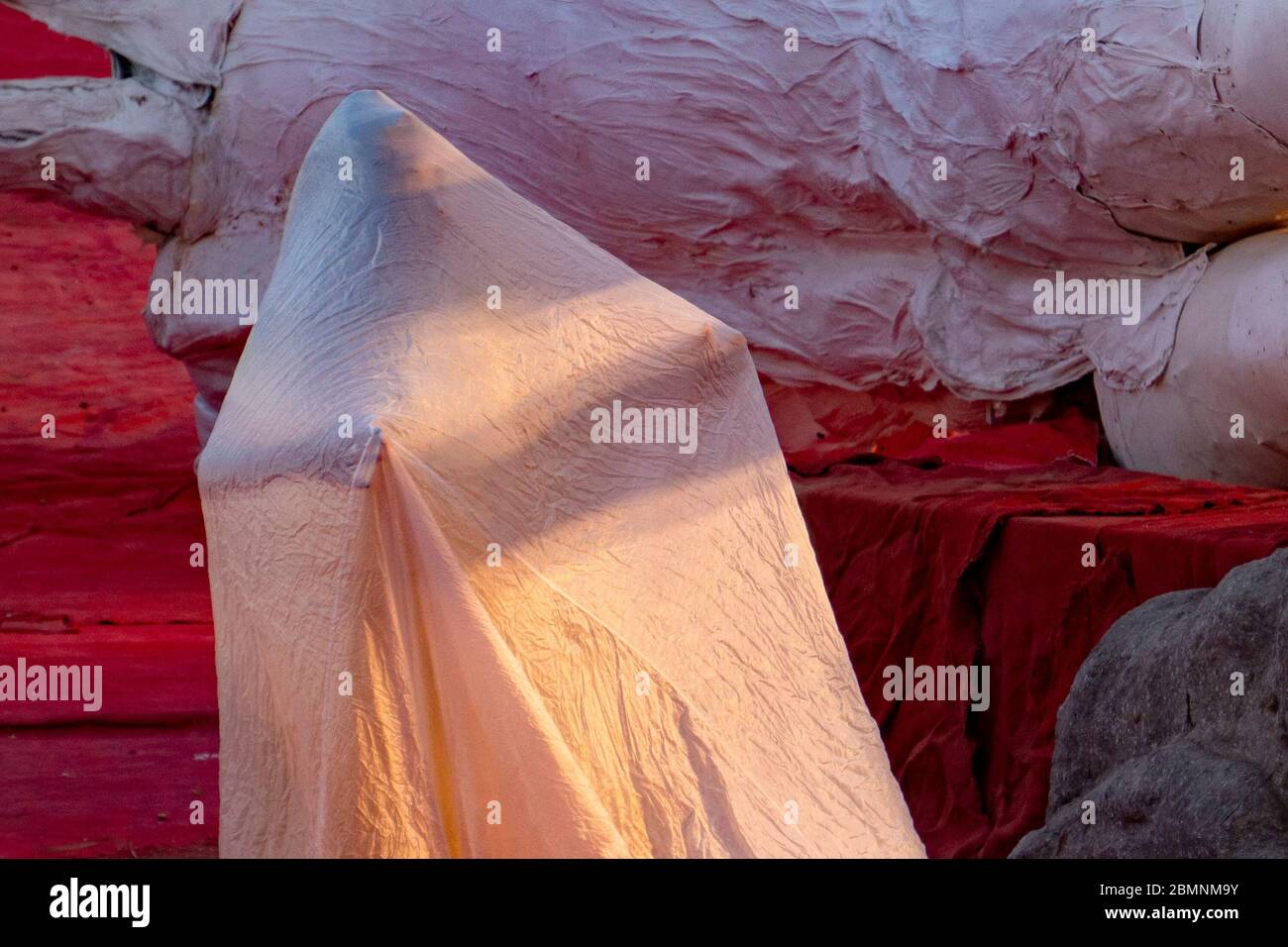 human playing ghost with white beed sheet Stock Photo - Alamy