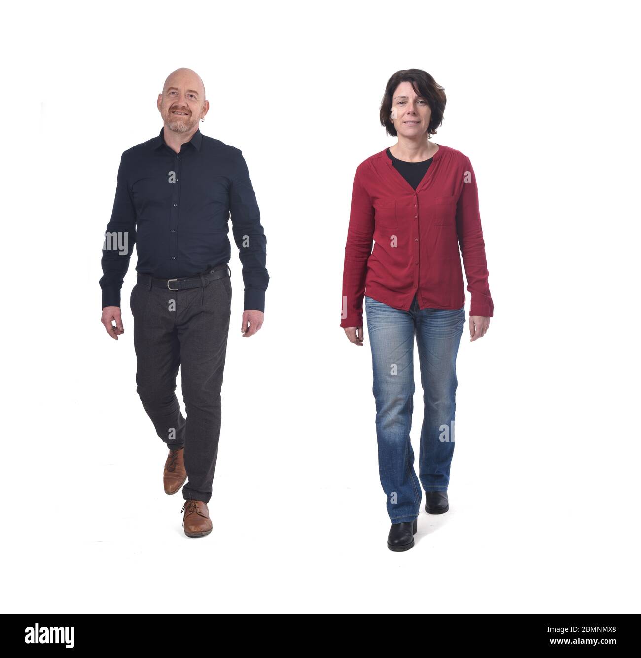 couple walking on white background, front Stock Photo - Alamy