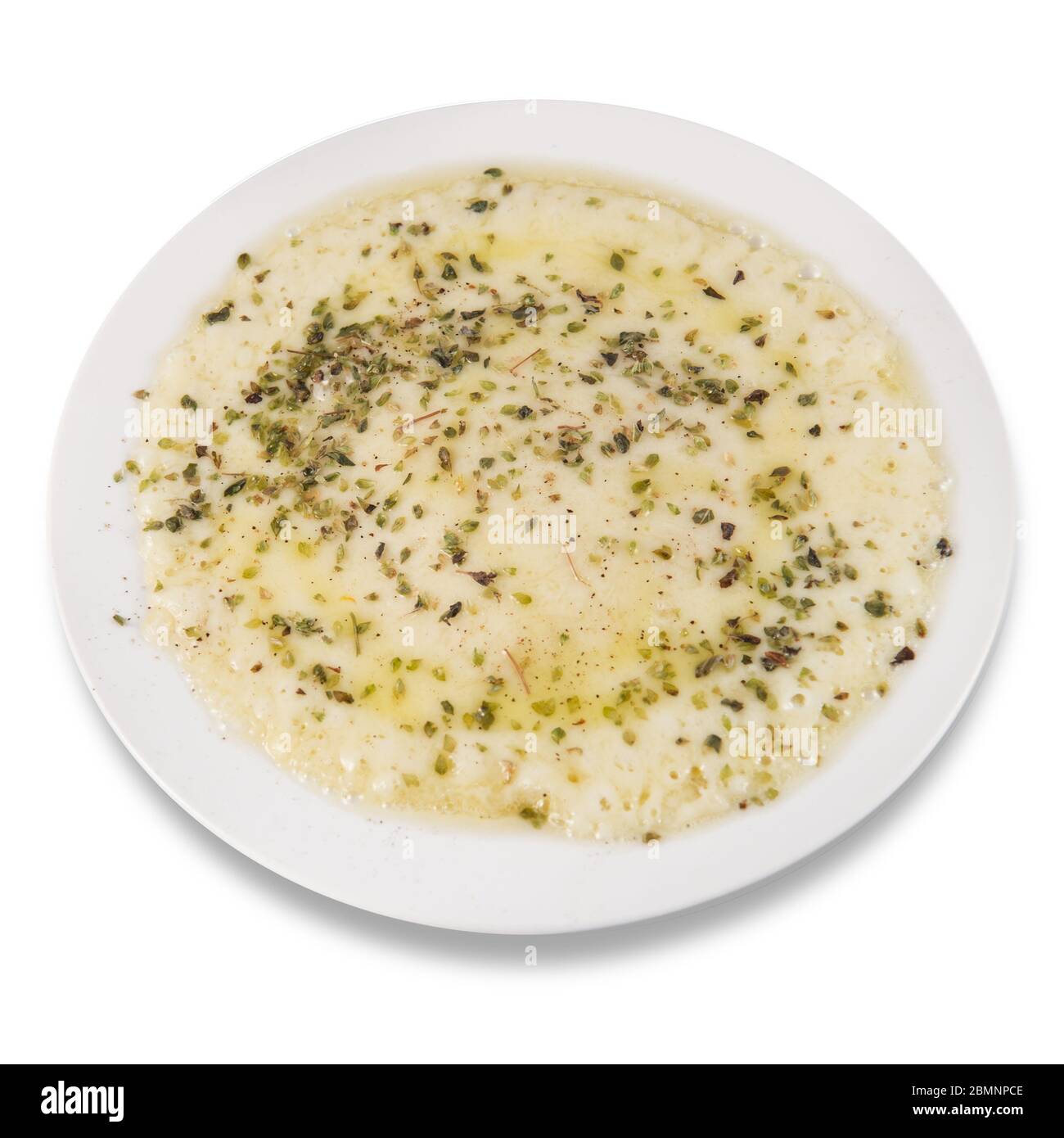 Grilled and melted provolone cheese with oregano Stock Photo - Alamy