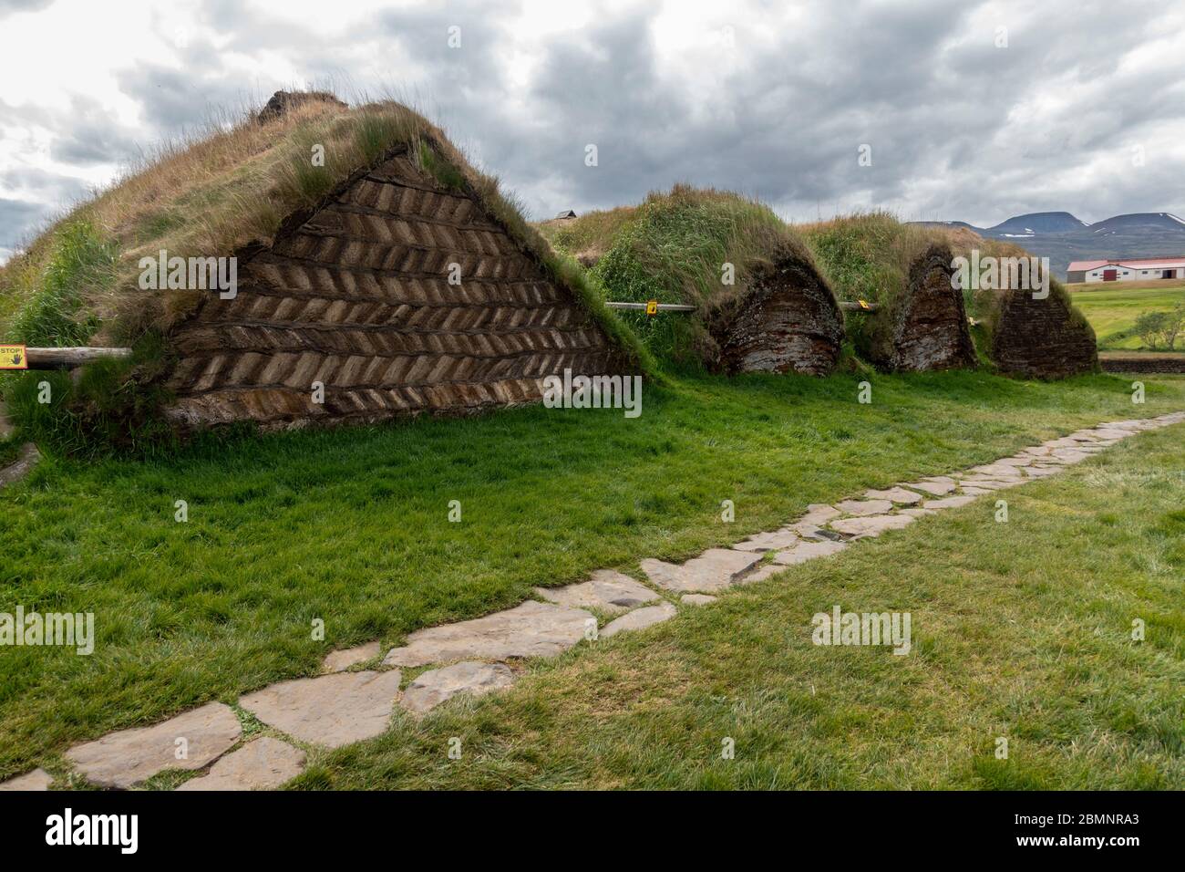 Detail showing the layers of turf at the back of farm buildings ...
