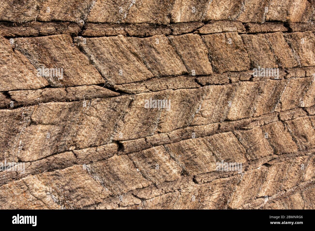 Detail showing the layers of turf at the back of farm buildings ...
