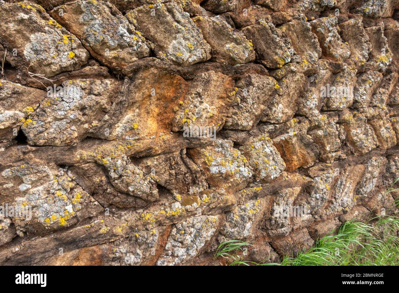 Detail showing the layers of turf at the back of farm buildings ...