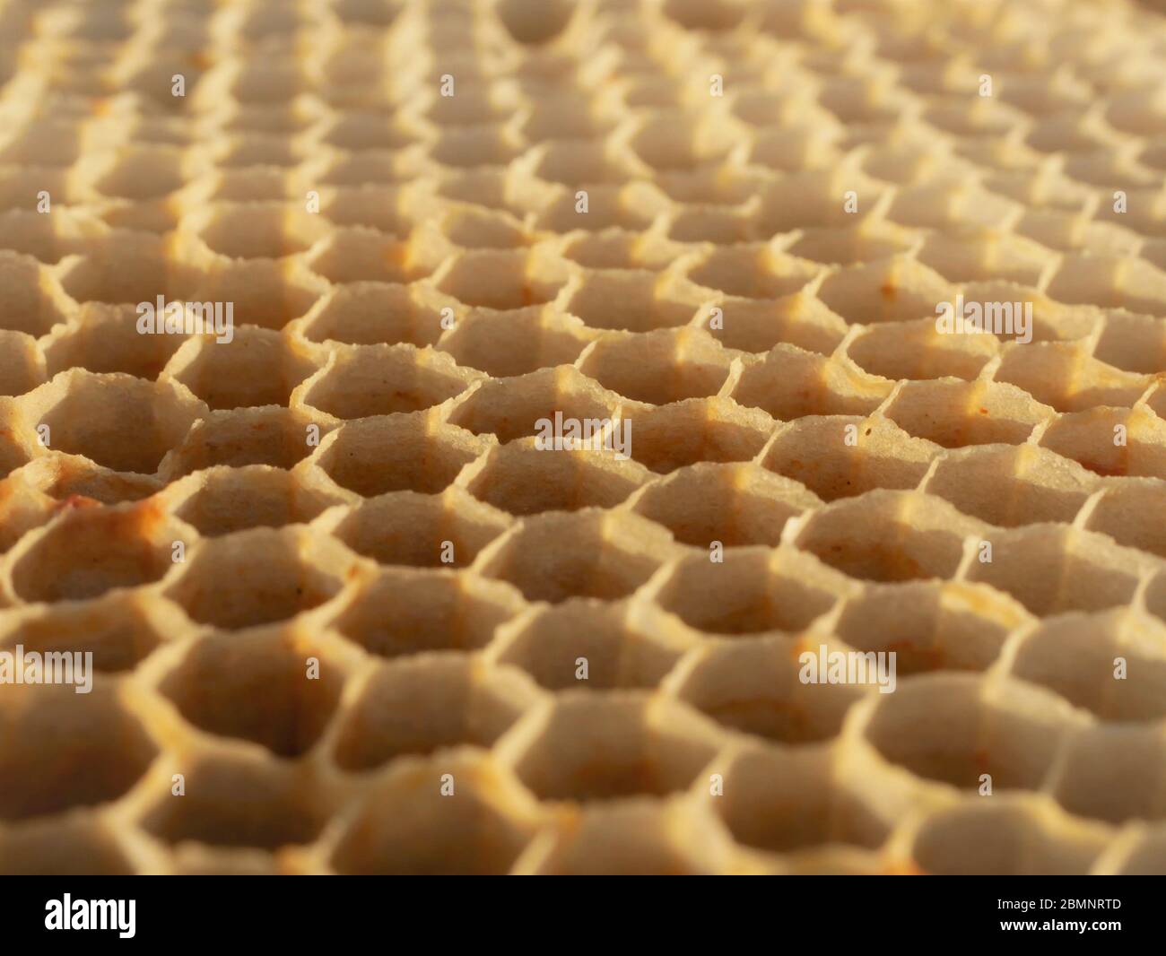 Close up of bee hive honey bee hexagonal cells Stock Photo - Alamy