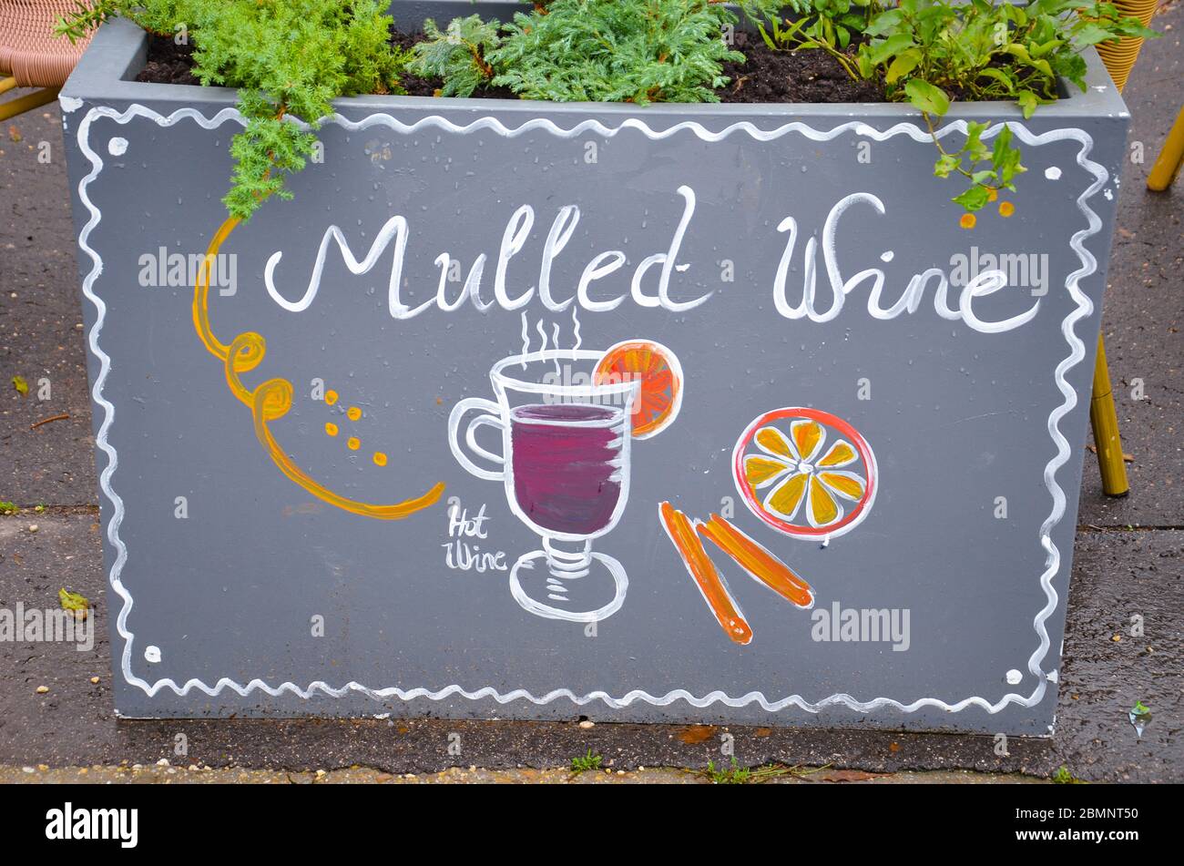 Handwritten sign mulled and simple drawing of a mulled wine glass with ...