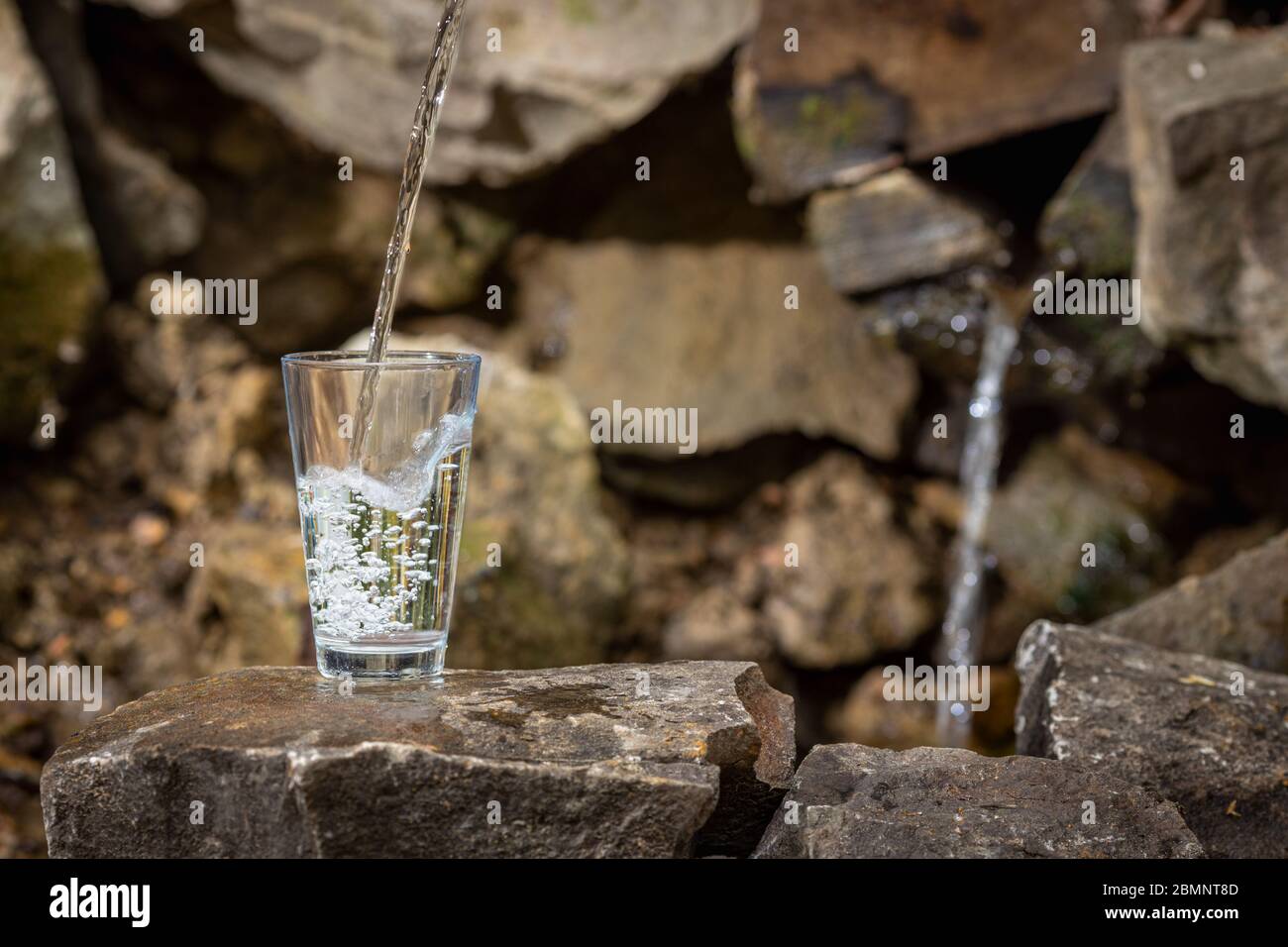 water pouring into glass Stock Photo - Alamy