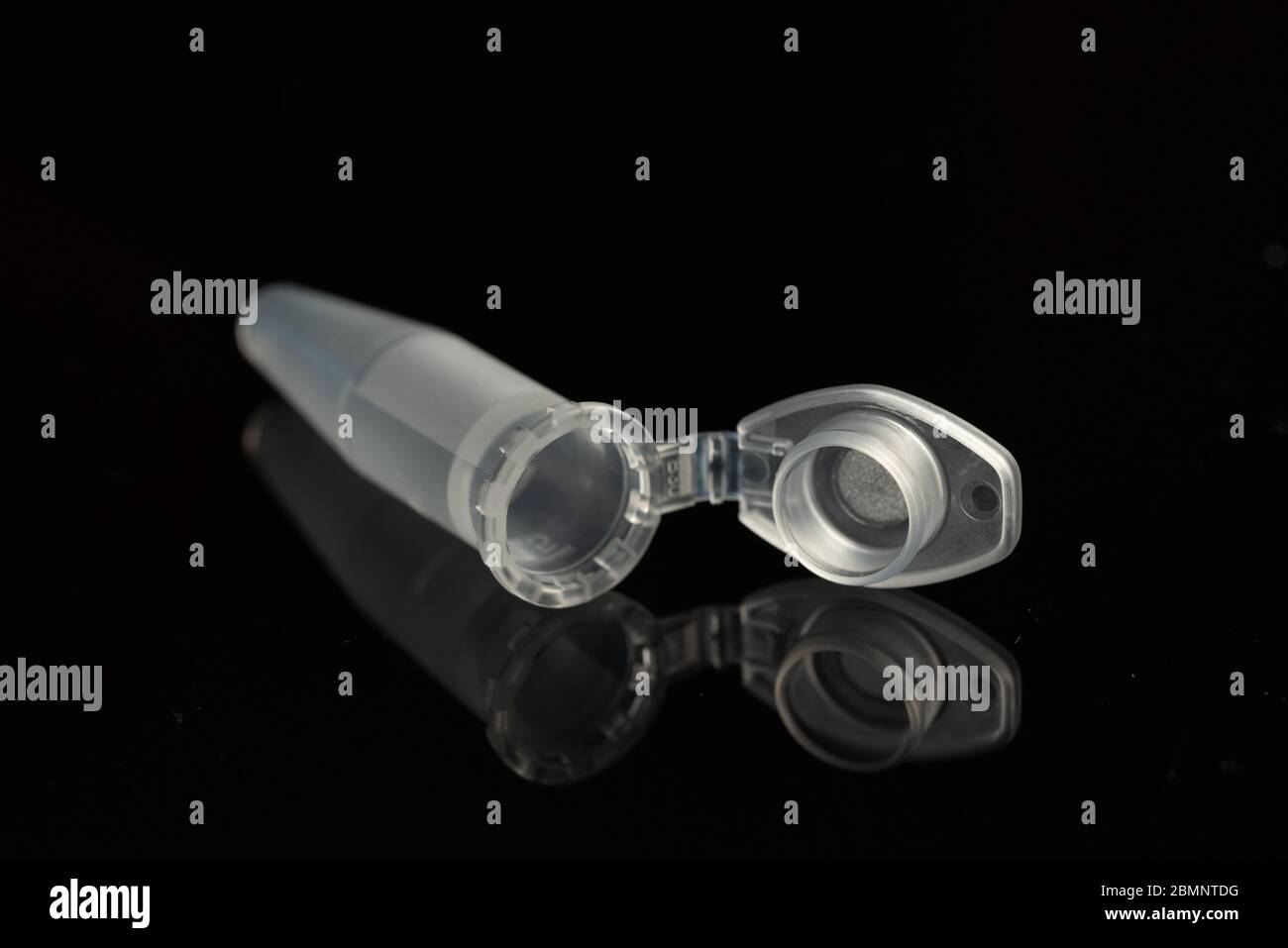 Pcr micro tube for coronavirus identification on black Stock Photo - Alamy