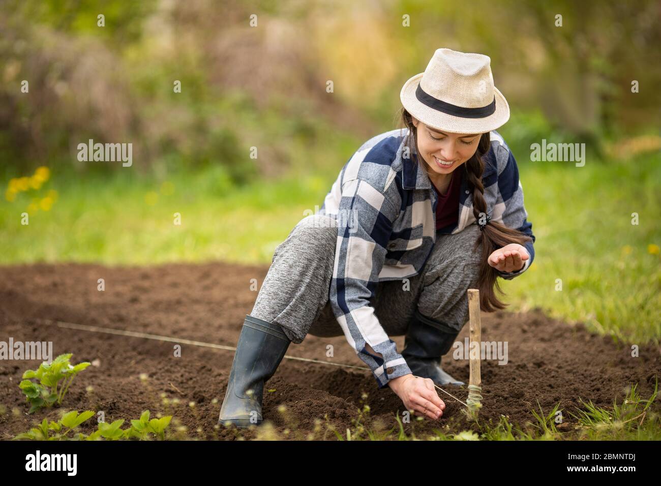 farmer planting seeds Stock Photo - Alamy