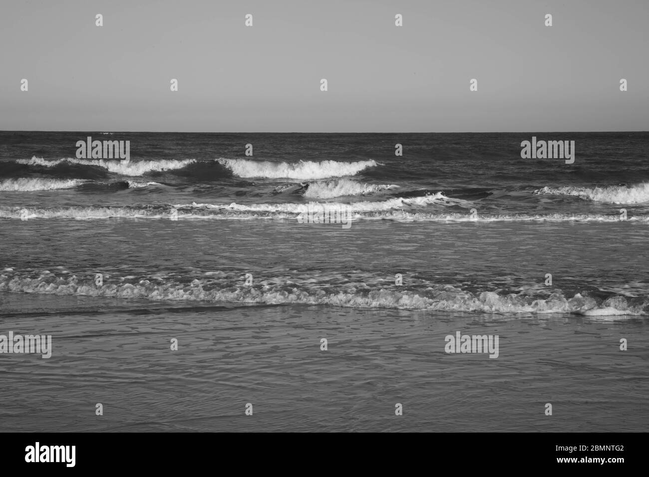 Ocean waves clouds in sky Black and White Stock Photos & Images - Alamy