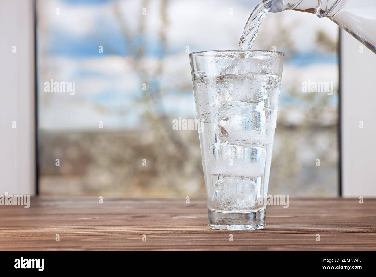Pour water from pitcher glass hi-res stock photography and images - Alamy
