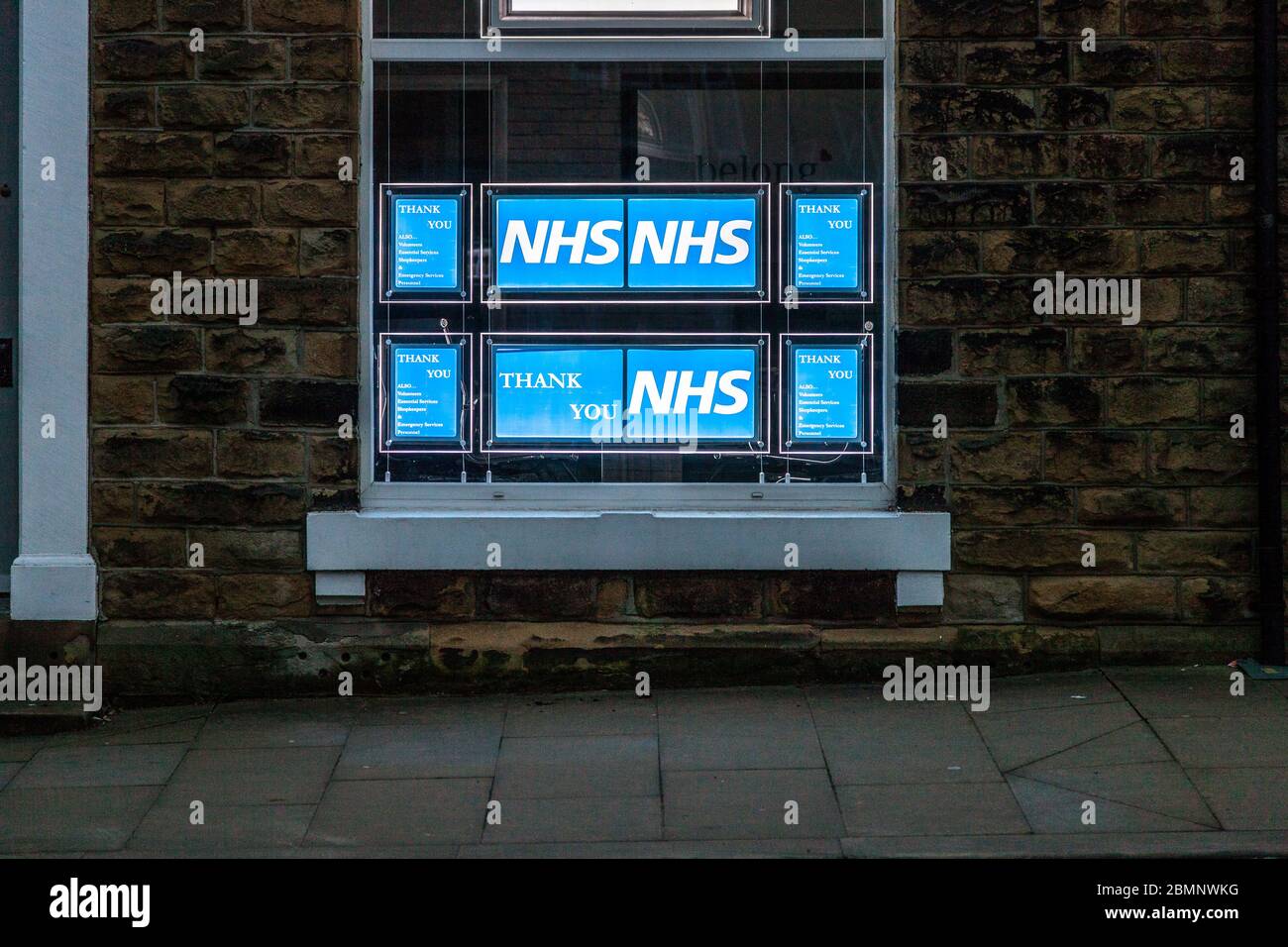 Signs showing support for the NHS in a shop window during the ...