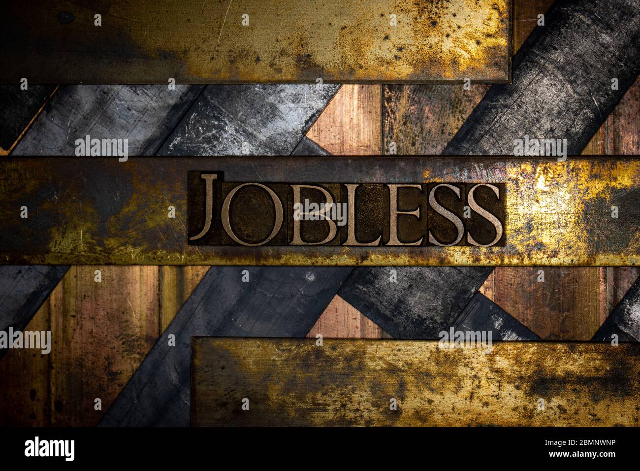 Photo of real authentic typeset letters forming Jobless text on vintage ...