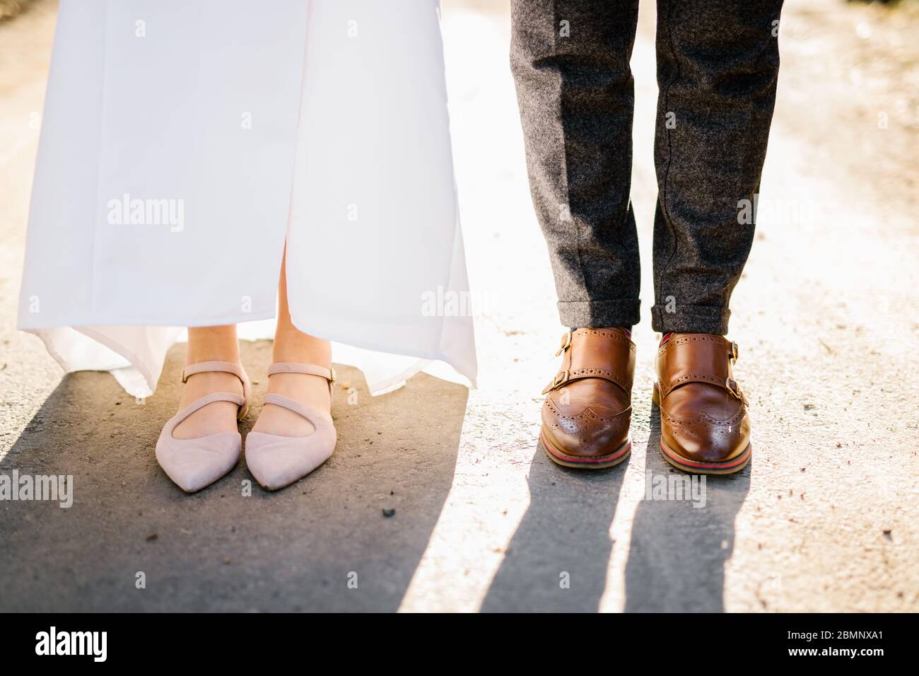 Bride and groom shoes close up Stock Photo - Alamy