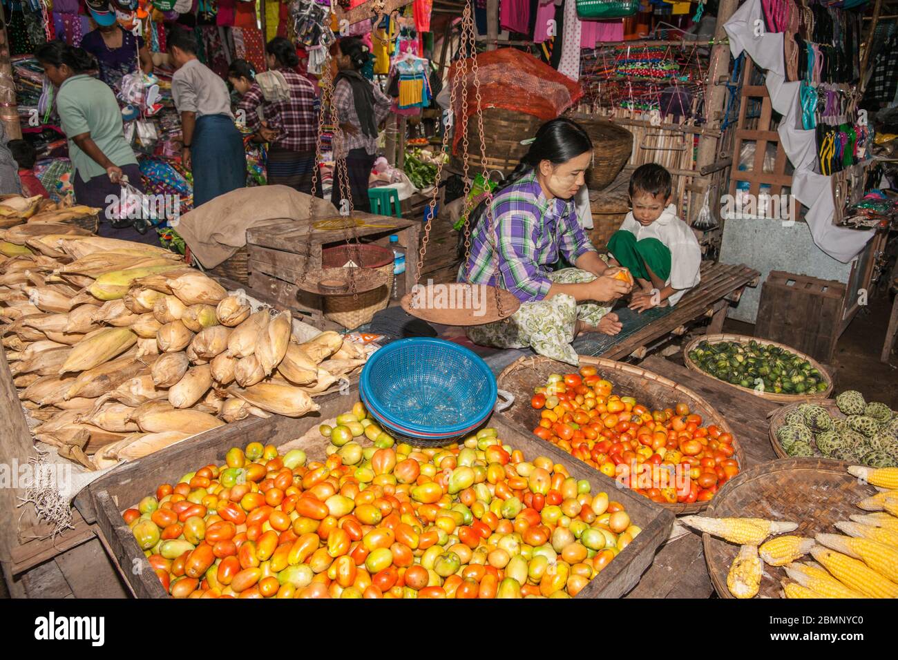 Bagan Myanmar October 29 2013; vendors in shop with woman and son ...