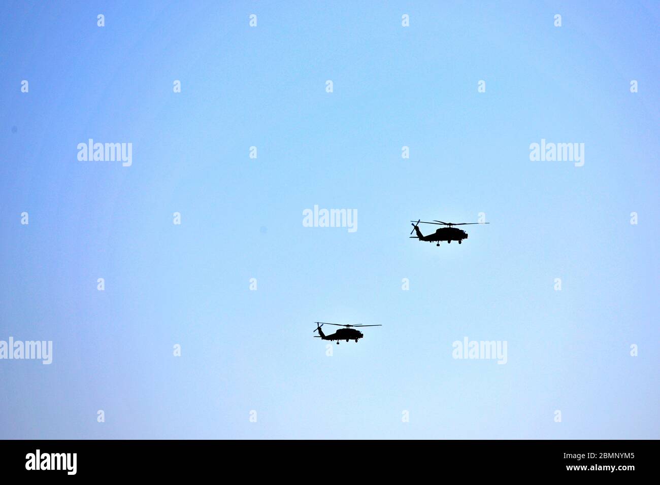 Helicopters in flight Stock Photo - Alamy