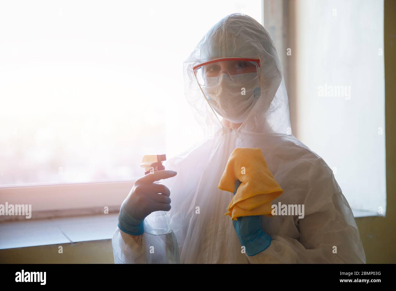 Close-up spray for disinfecting and cleaning surface of viruses and germs. Coronavirus ...