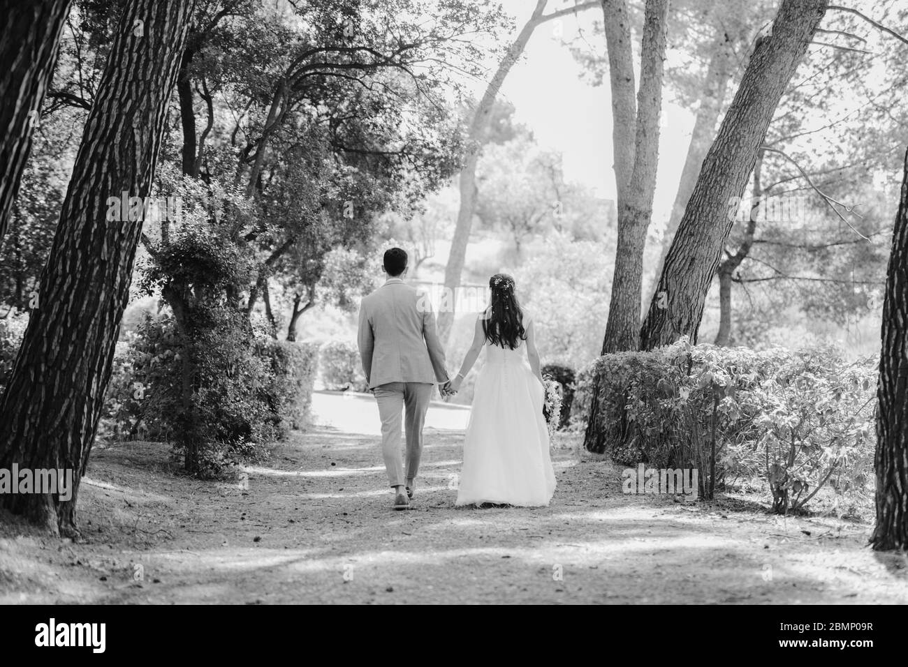 Bride and groom walking together Stock Photo - Alamy