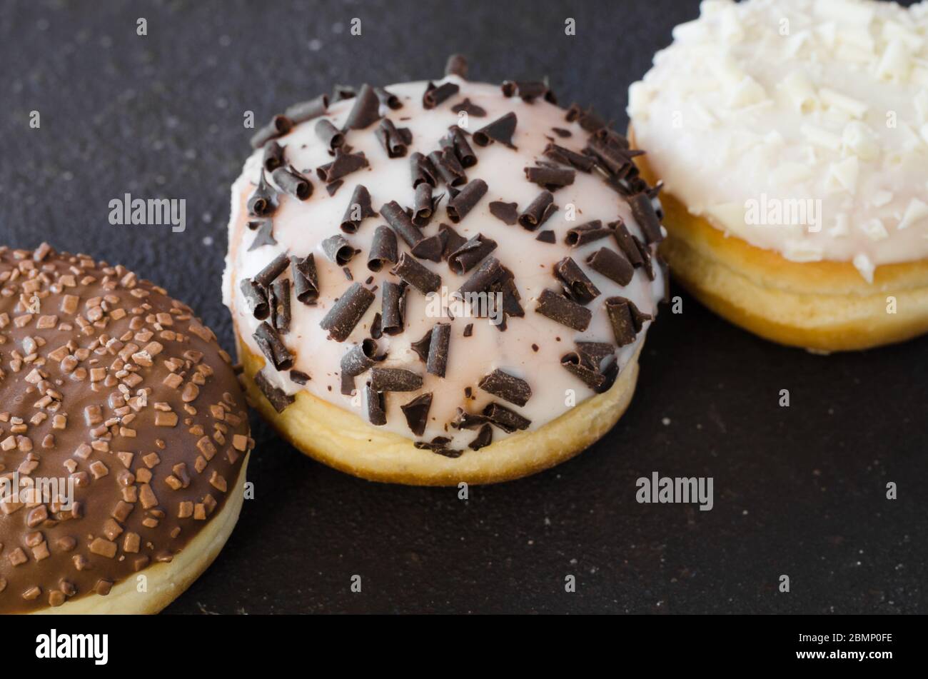 Traditional donut day. Assorted donuts with chocolate glazed on ...