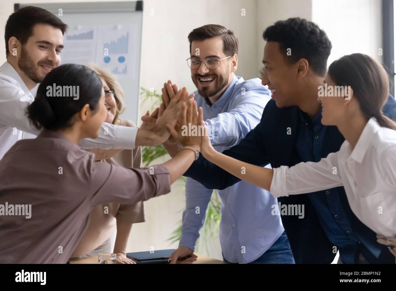 Diverse office workers happy hi-res stock photography and images - Alamy