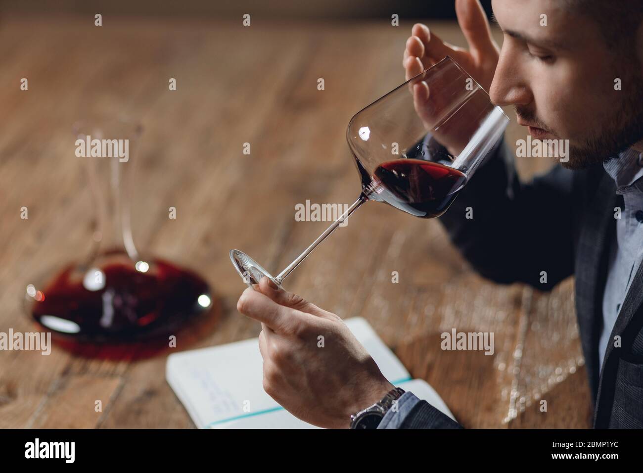 Man sniffing cork hi-res stock photography and images - Alamy