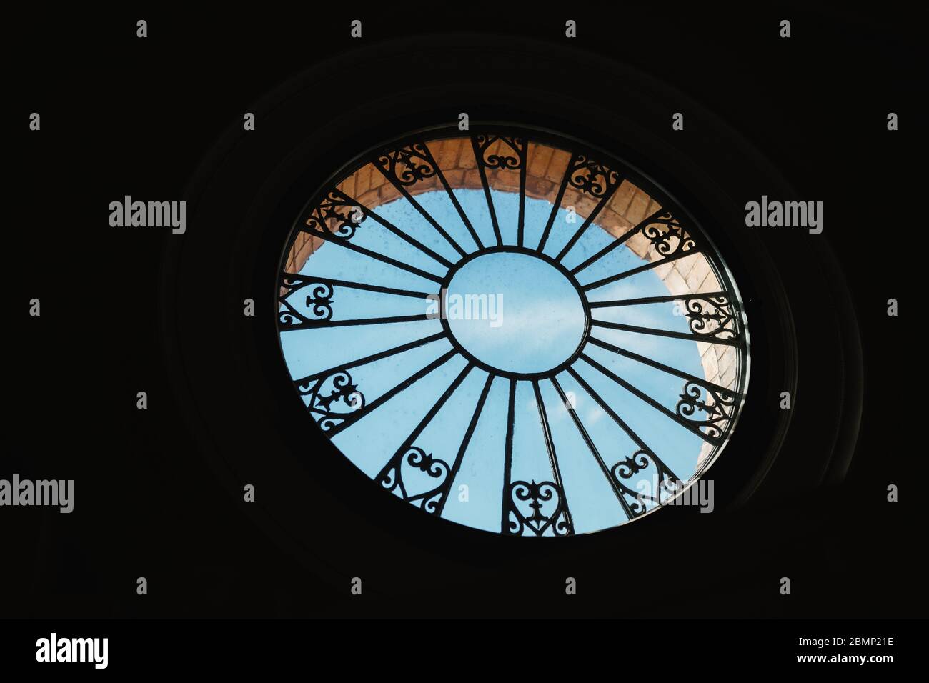 photo of an old round window in a church Stock Photo - Alamy