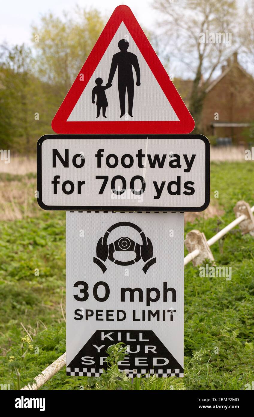 Road traffic signs warning of hazards no footway 30 mph speed limit ...