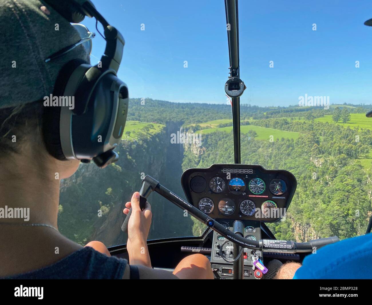 This pilot is steering his helicopter directly towards a precipice. In ...