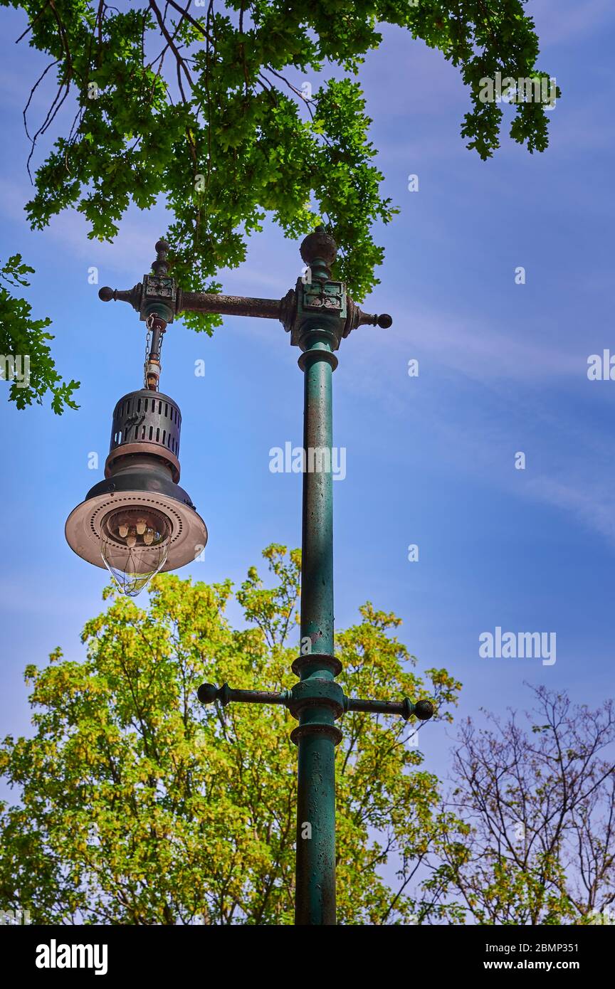 Historic and still functional street lamp that is powered by gas and ...