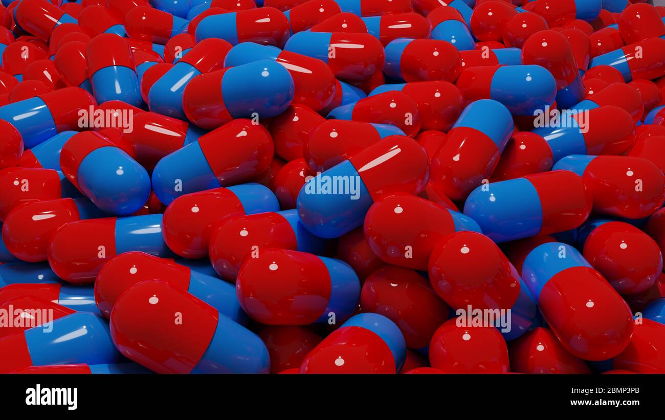 large number of two-color medical capsules Stock Photo - Alamy