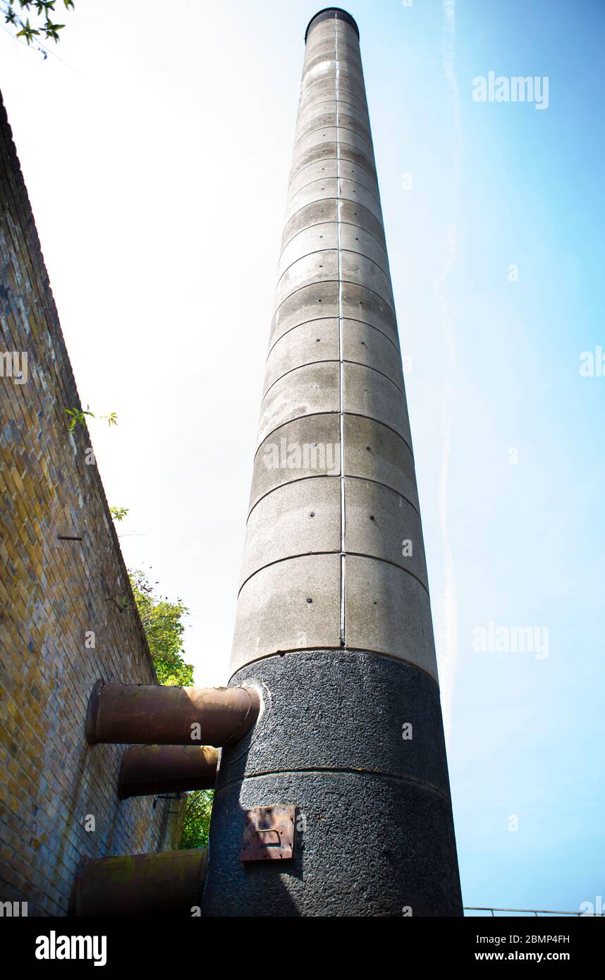 Industrial building tall chimney hi-res stock photography and images ...