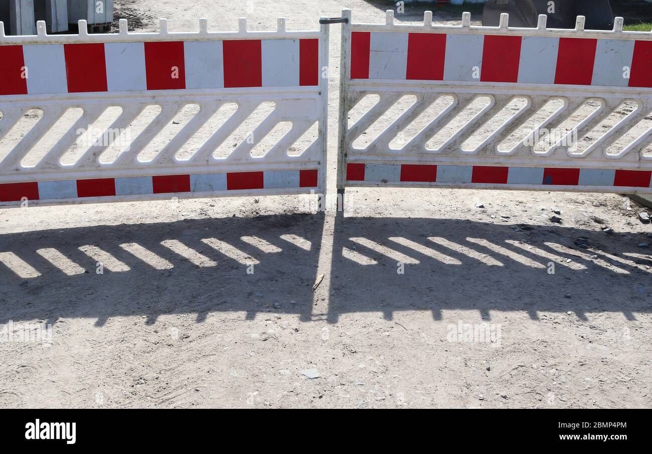 Close up view on a construction site barrier in Europe Stock Photo - Alamy