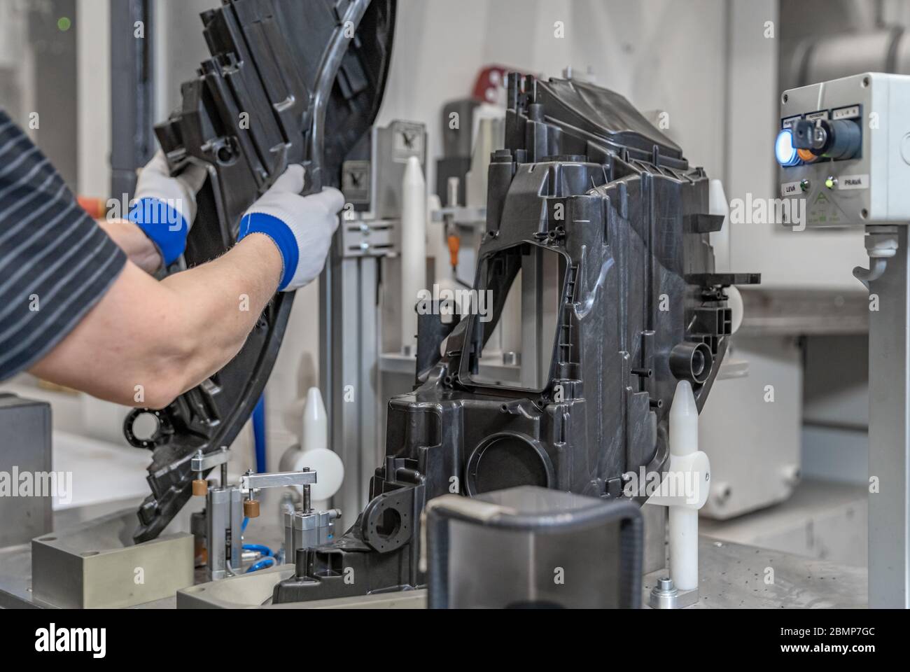 assembly of plastic molds on the production line in the factory Stock ...