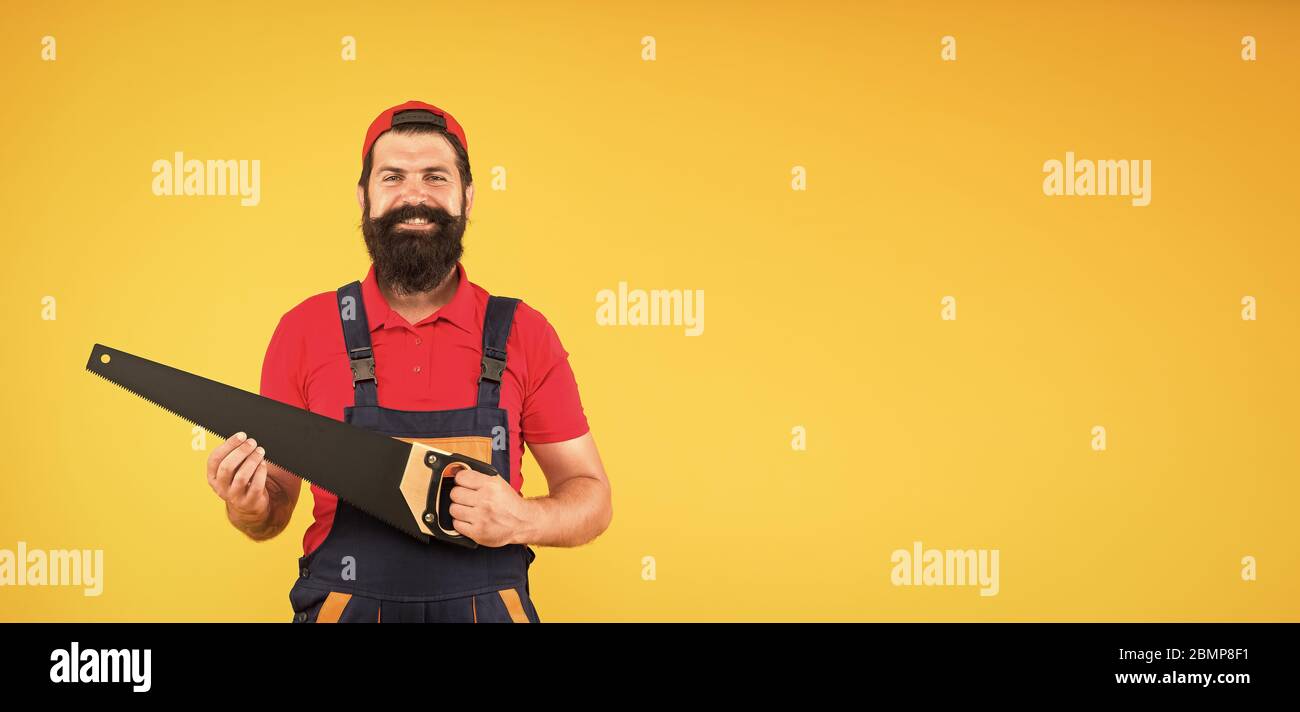 Sharp blade of saw. Dangerous job. Feeling manly. Carpenter with saw in ...