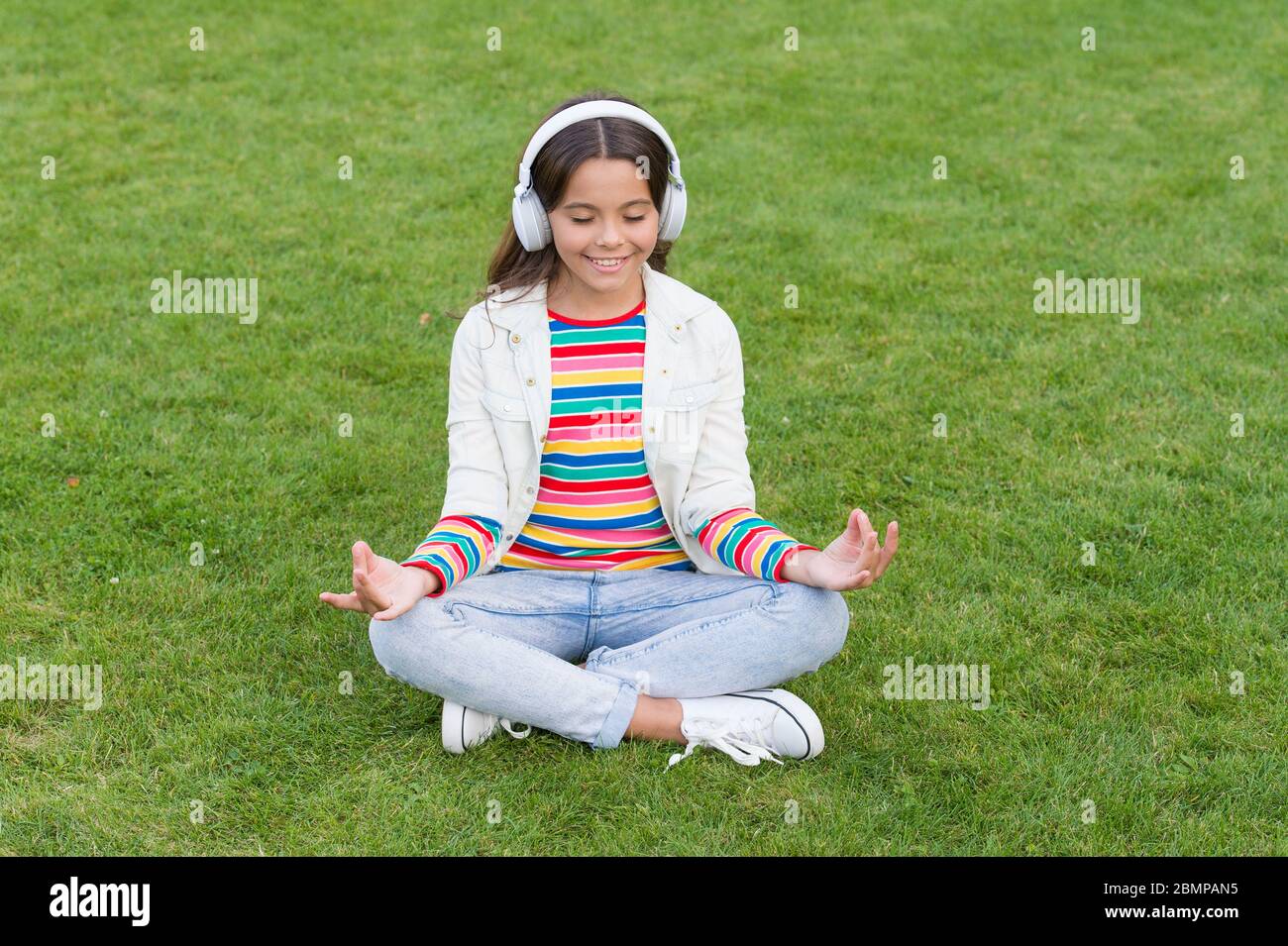 Do not bother me. Cool girl headphones listening music. Educational ...