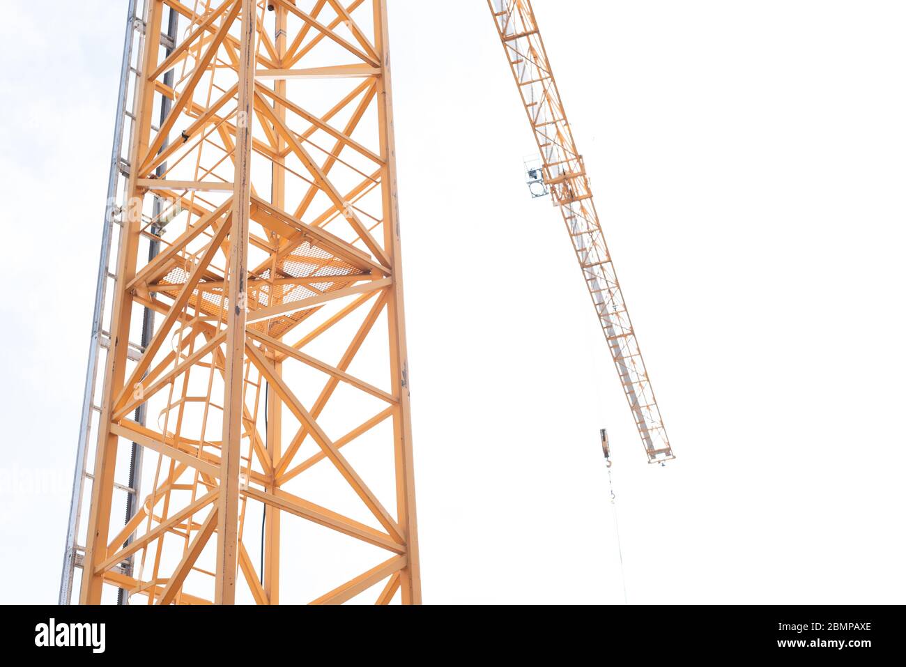Yellow tower crane Cut Out Stock Images & Pictures - Alamy