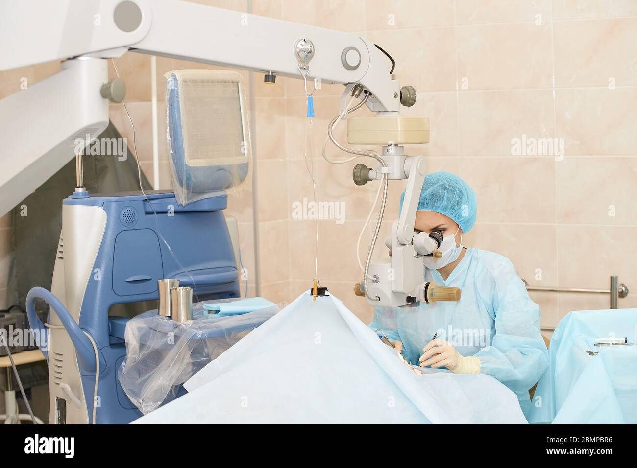 Ophthalmology laser microscope operation. Doctor in clinic. Patient eye ...