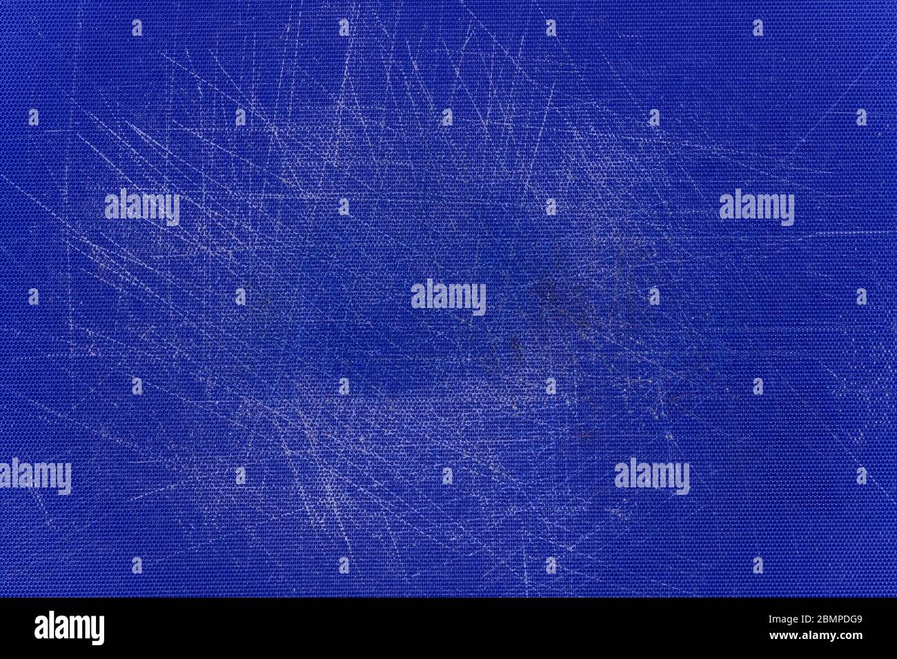Blue, plastic, grained cutting board with a lot of scratches Stock ...