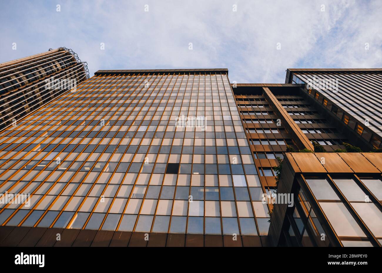 View from below of a high-rise buildings in business center during ...