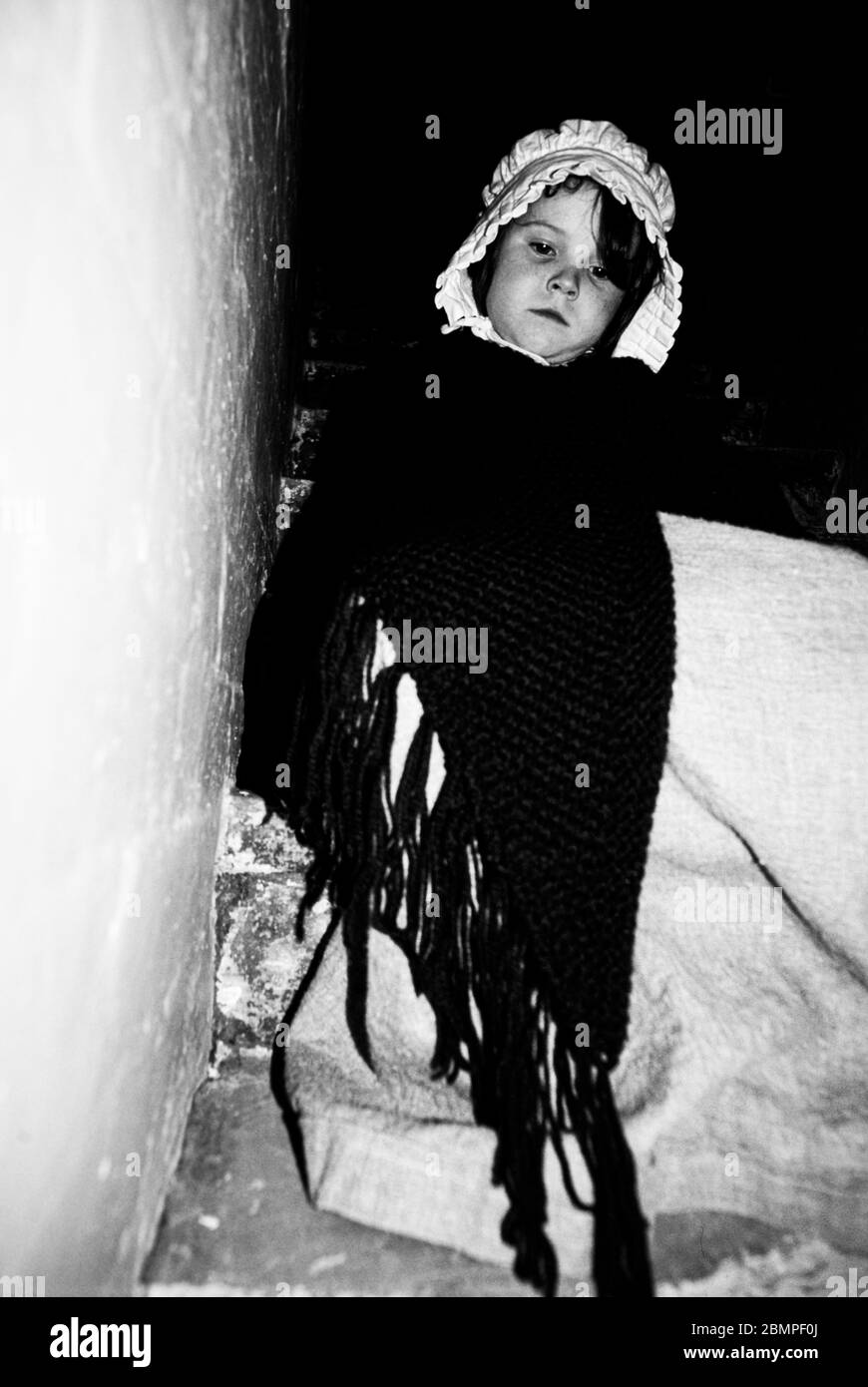 A black and white photograph of a young girl / child dressed in 19th ...