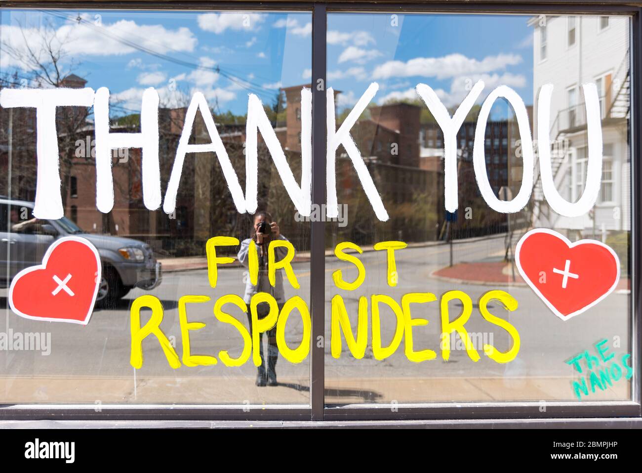 Thank You First Responders sign painted in a store window showing ...