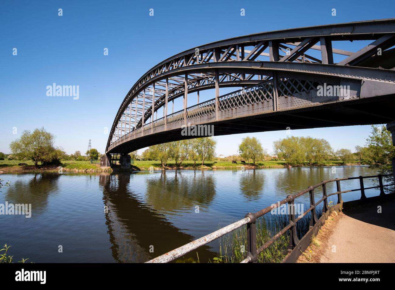 Long single span bridge across a river Stock Photo - Alamy
