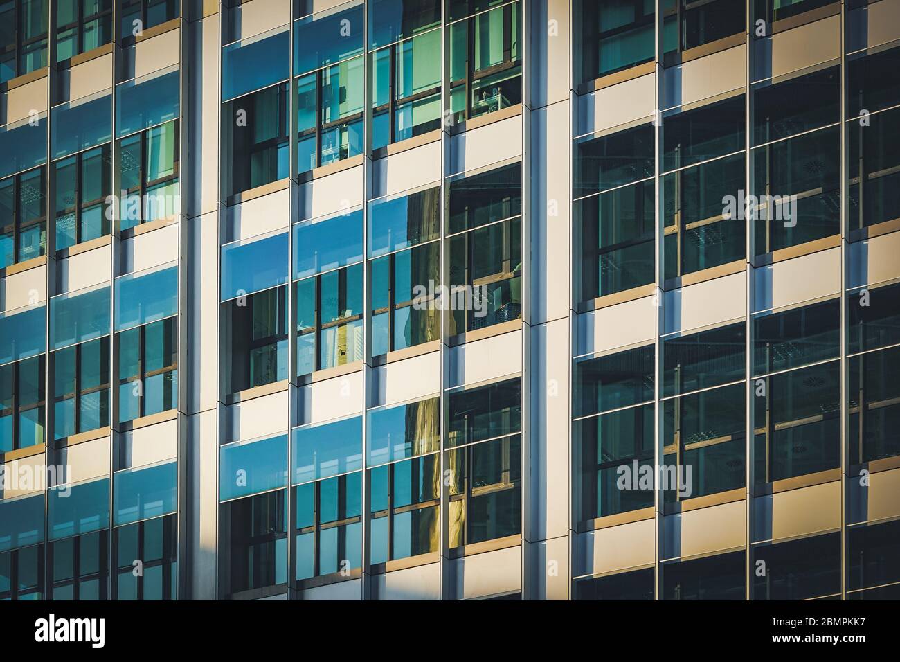 Facade of an office building under the afternoon light Stock Photo - Alamy