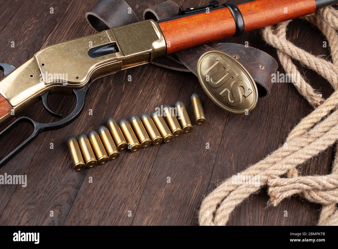 Wild west weapons and ammunition on wooden table Stock Photo - Alamy