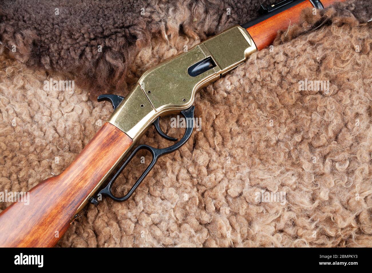 Wild west gun and ammunition on skins backgrond Stock Photo - Alamy