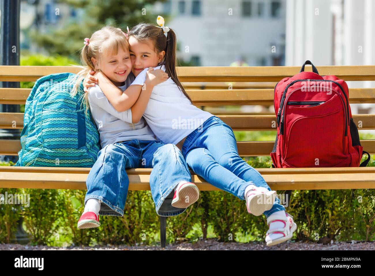 happy little girls with classmates having fun at the School Stock Photo ...
