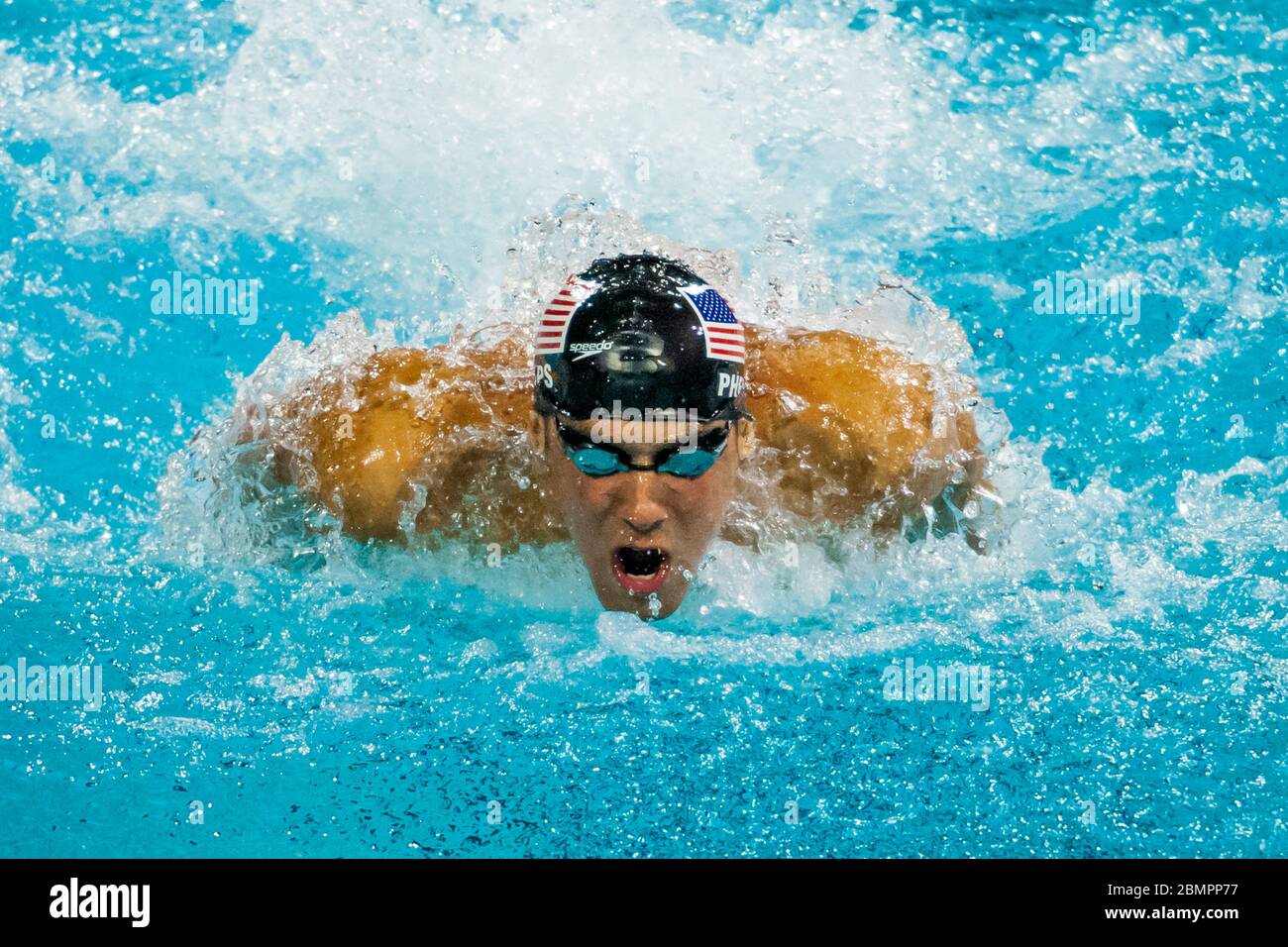 Michael Phelps (USA) competes in theMen's 100 metre butterfly ...
