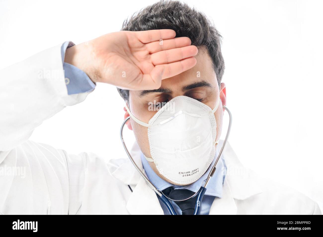 Portrait of a sick doctor having Covid-19 symptoms, isolated on white ...